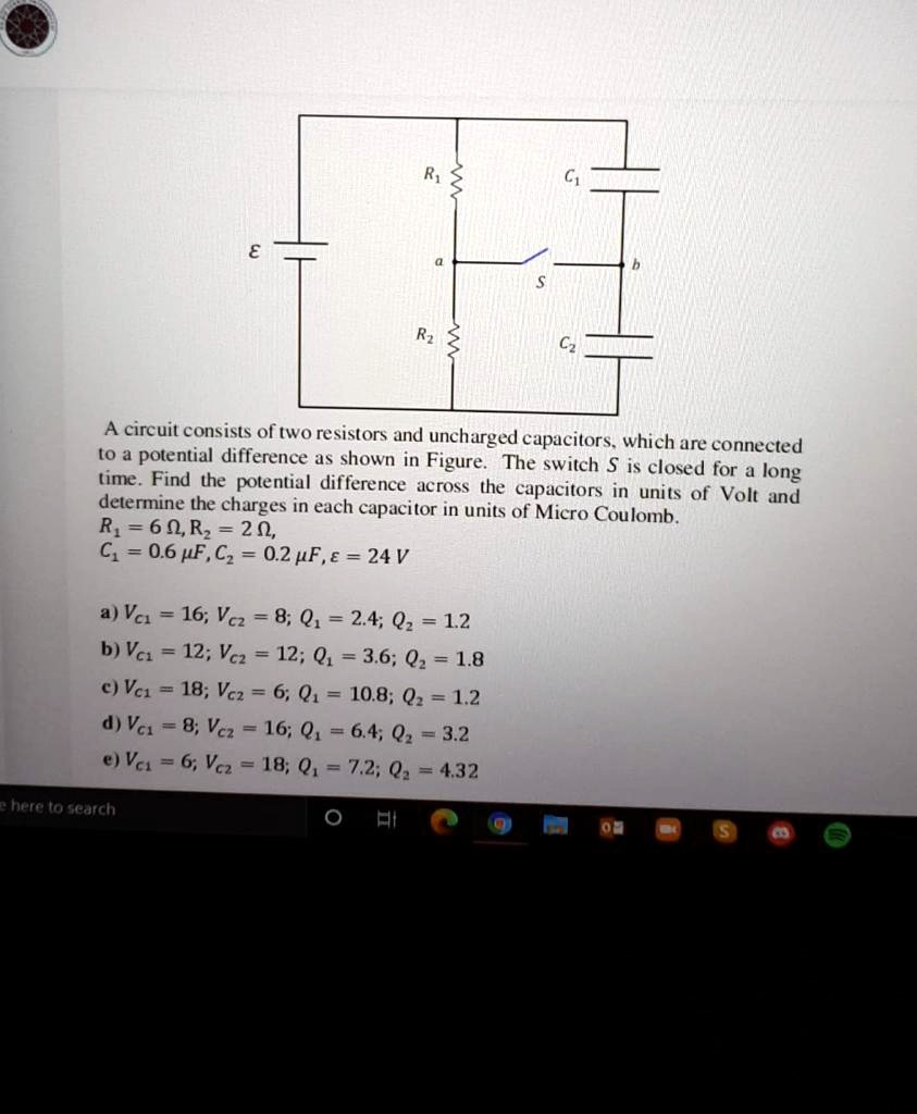 a circuit consists of two resistors and uncharged capacitors which to a ...