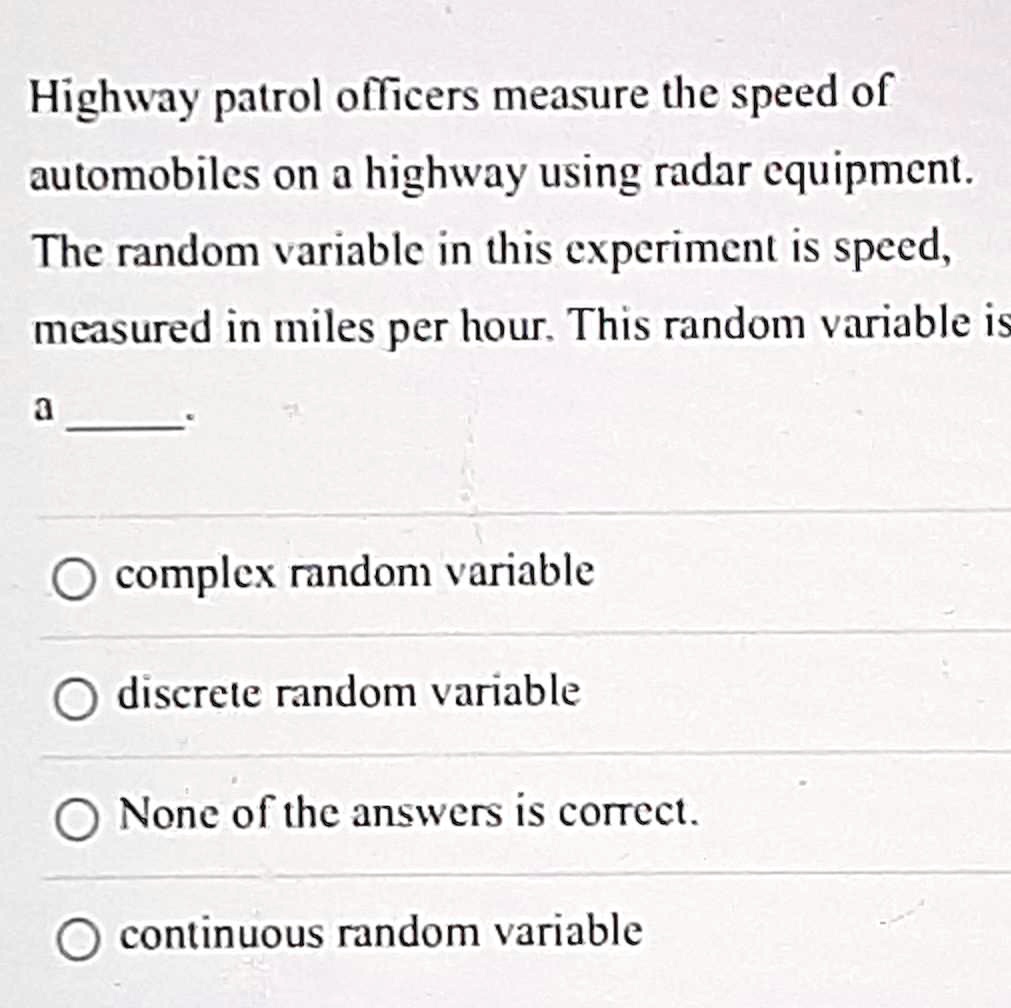 Highway patrol officers measure the speed of automobiles on a highway ...