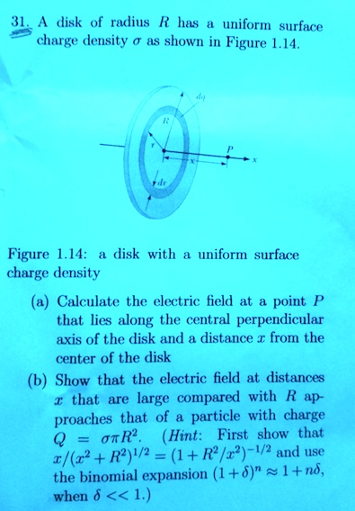SOLVED: 31. A disk of radius R has a uniform surface charge density as shown in Figure 1.14 ...