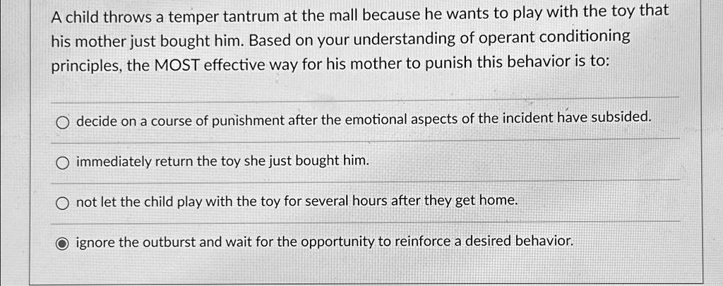 a child throws a temper tantrum at the mall because he wants to play ...
