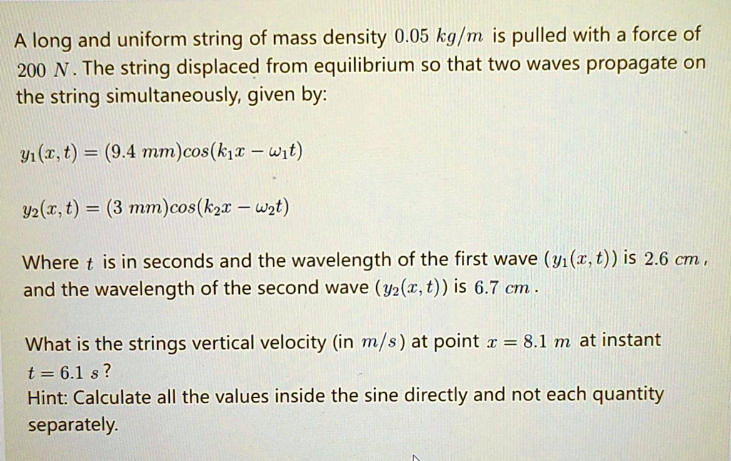 SOLVED: A long and uniform string of mass density 0.05 kg/m is pulled ...